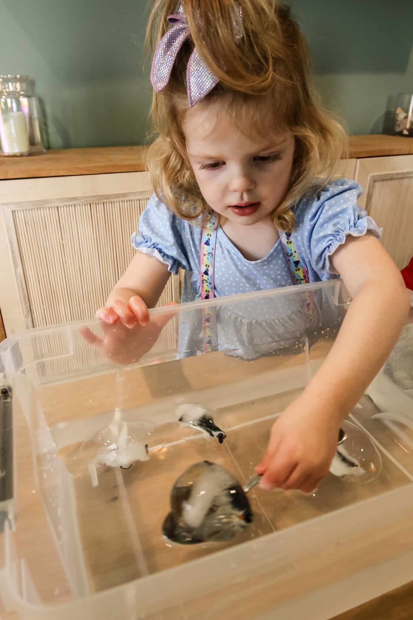 Penguin Ice Sensory Play - Celebrating with kids
